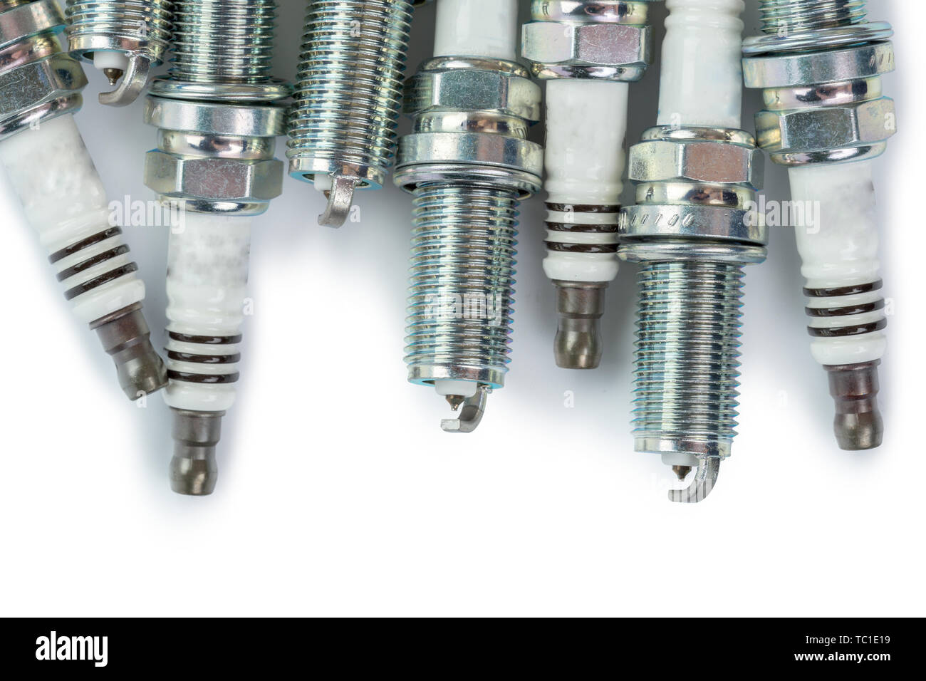 spark plugs isolated on white Stock Photo - Alamy