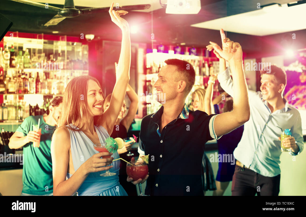 Young european people dancing in a club hi-res stock photography and ...