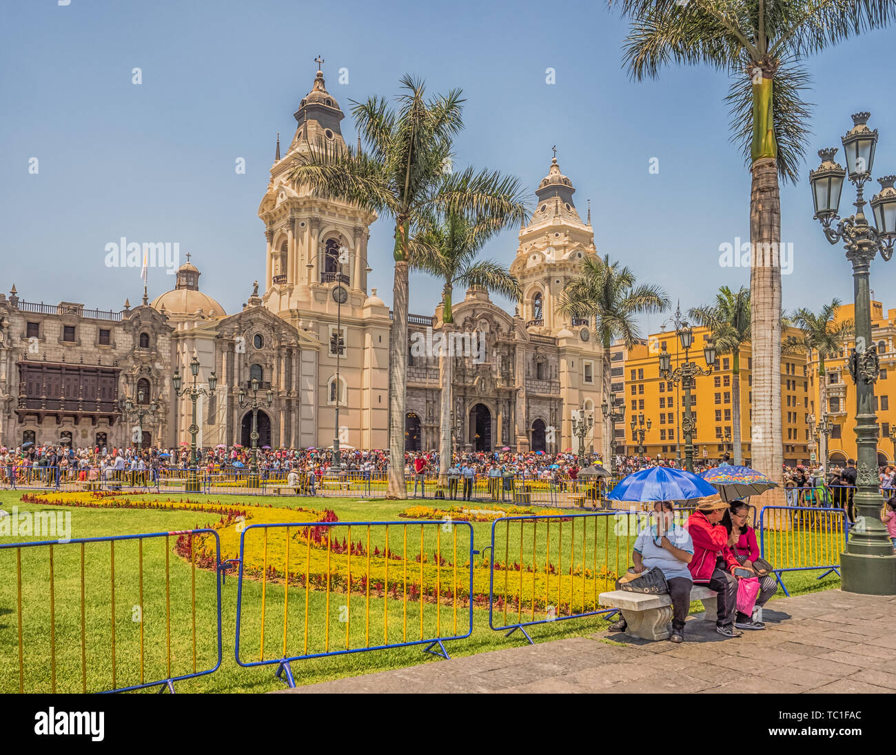 Lima, Peru - March 29, 2018: People with colorful umbrellas on a hot ...
