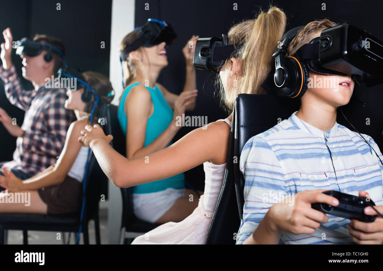 Happy family of five is watching VR together in the room Stock Photo ...
