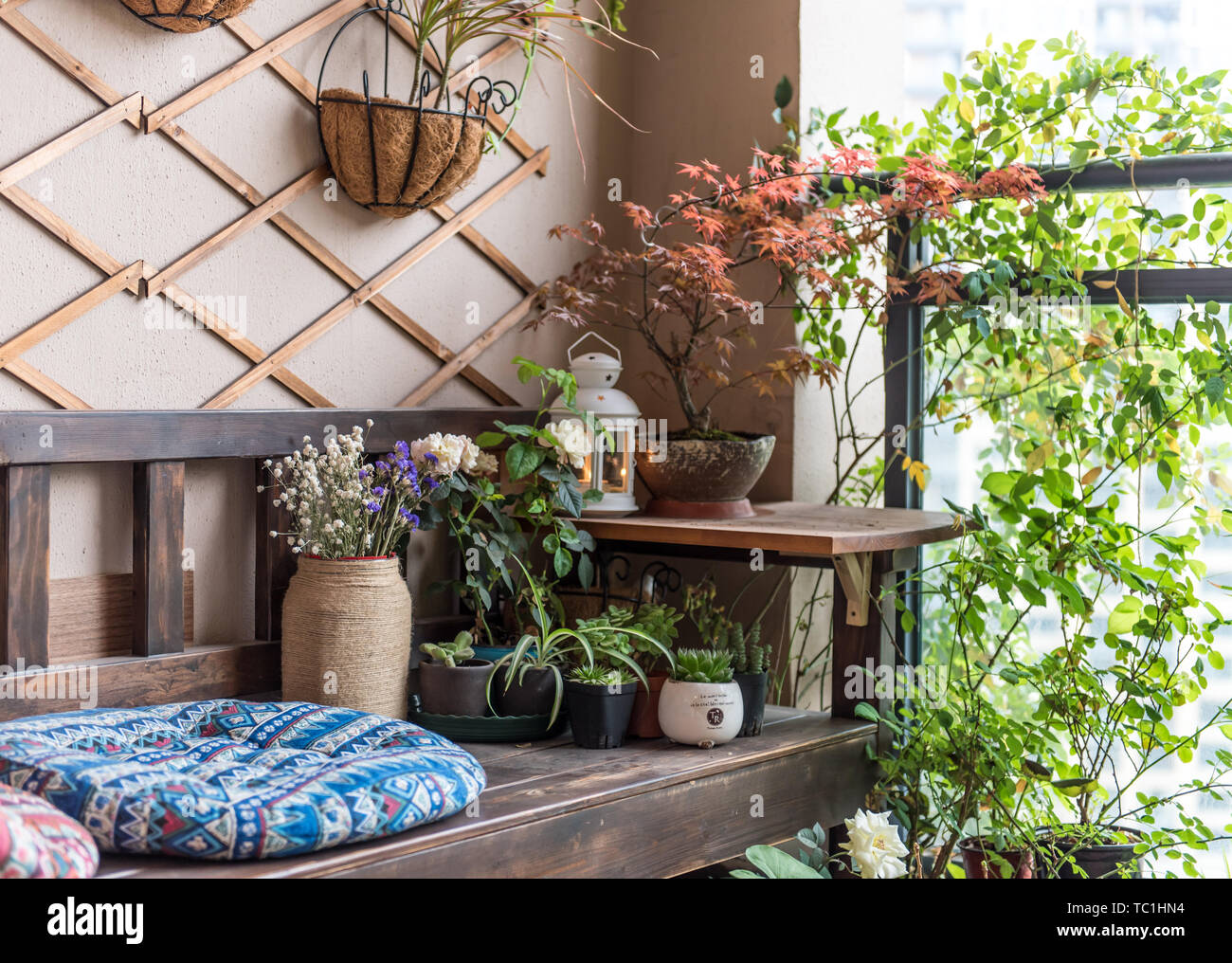 Balcony garden with seating plant landscape Stock Photo - Alamy