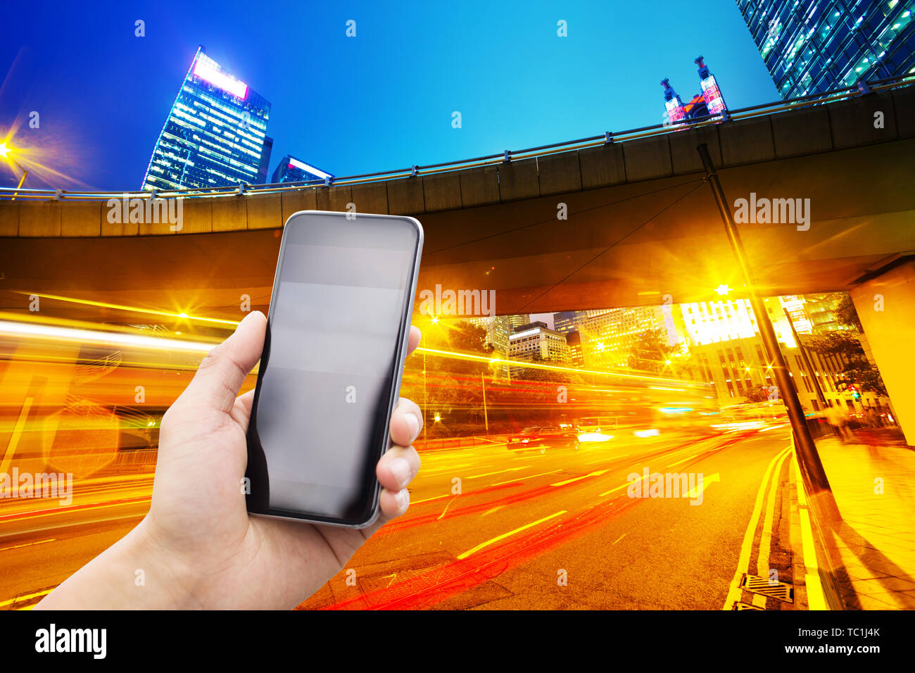 mobile phone with traffic on road at night Stock Photo - Alamy