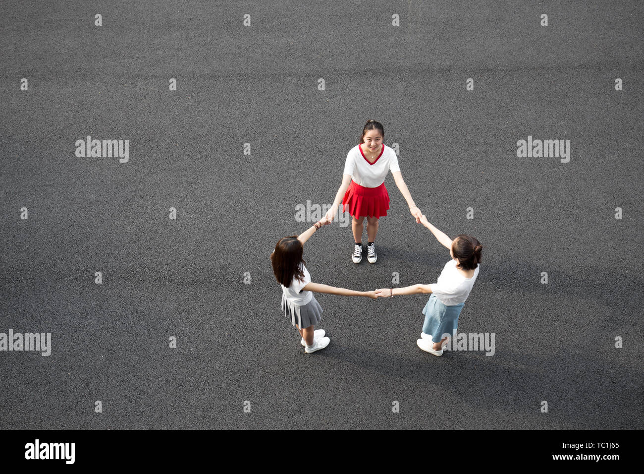 Hands together with triangle Stock Photo - Alamy