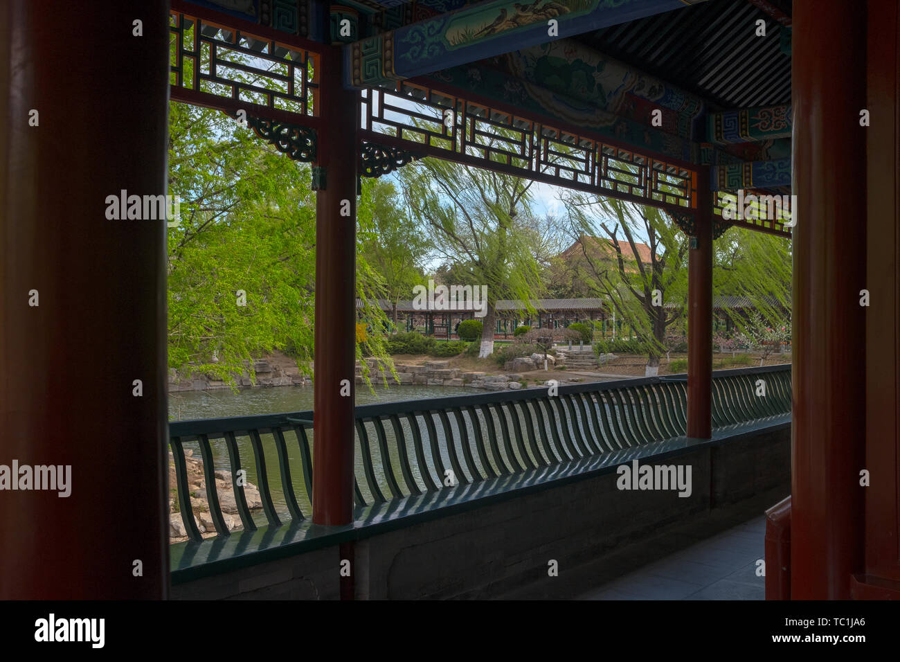 Scenery outside the pavilion seen in the gazebo hallway Stock Photo - Alamy