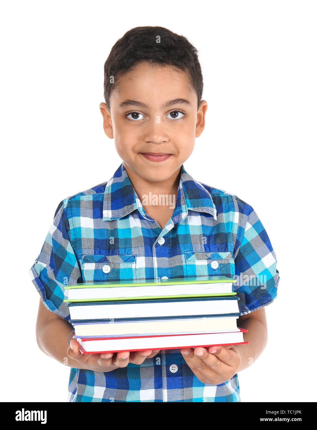 Portrait of cute little boy with books on white background Stock Photo ...