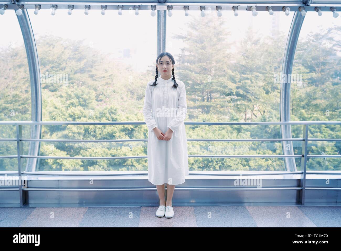 Time machine freehand girl portrait Stock Photo - Alamy