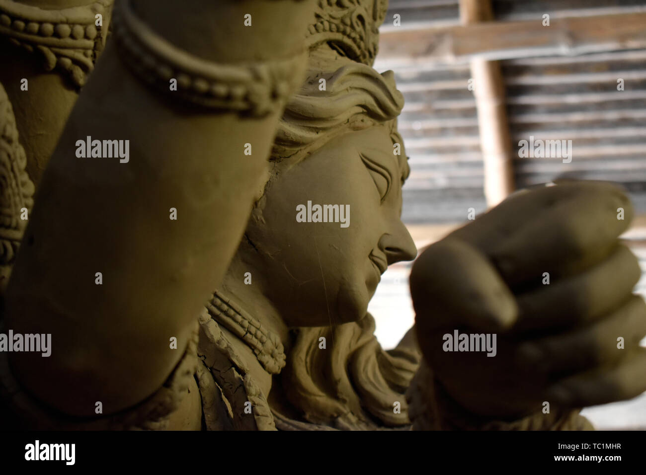 Clay idol of Durga in the making Stock Photo - Alamy