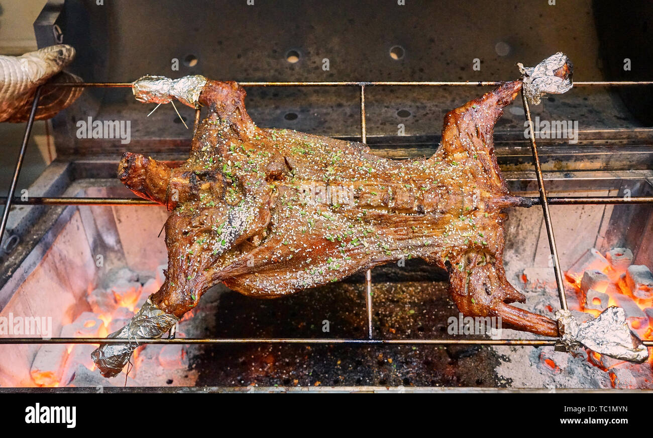 Roasted whole sheep on the oven Stock Photo - Alamy