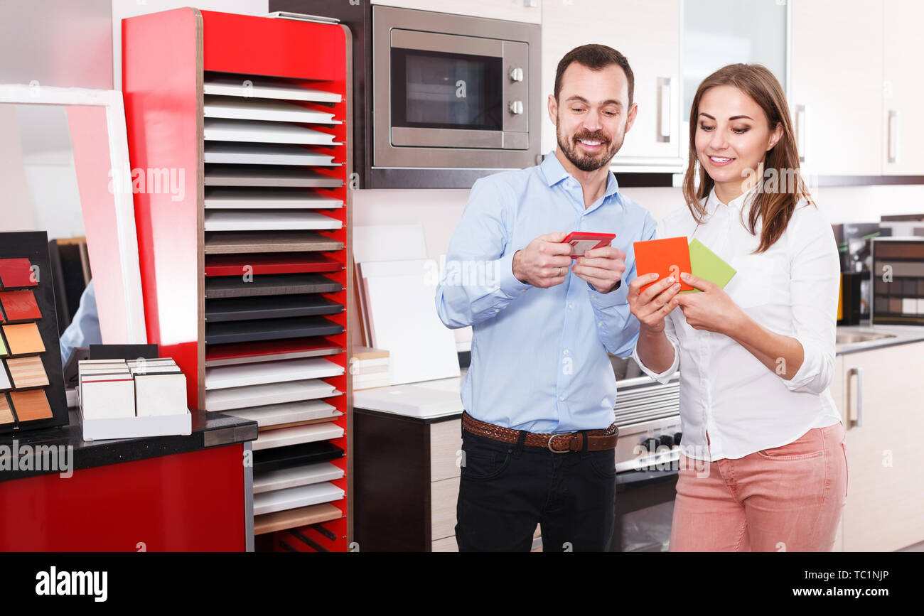 Couple choosing kitchen materials hi-res stock photography and images ...