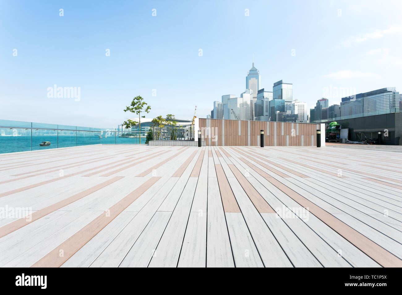 Empty footpath with cityscape at far away Stock Photo - Alamy