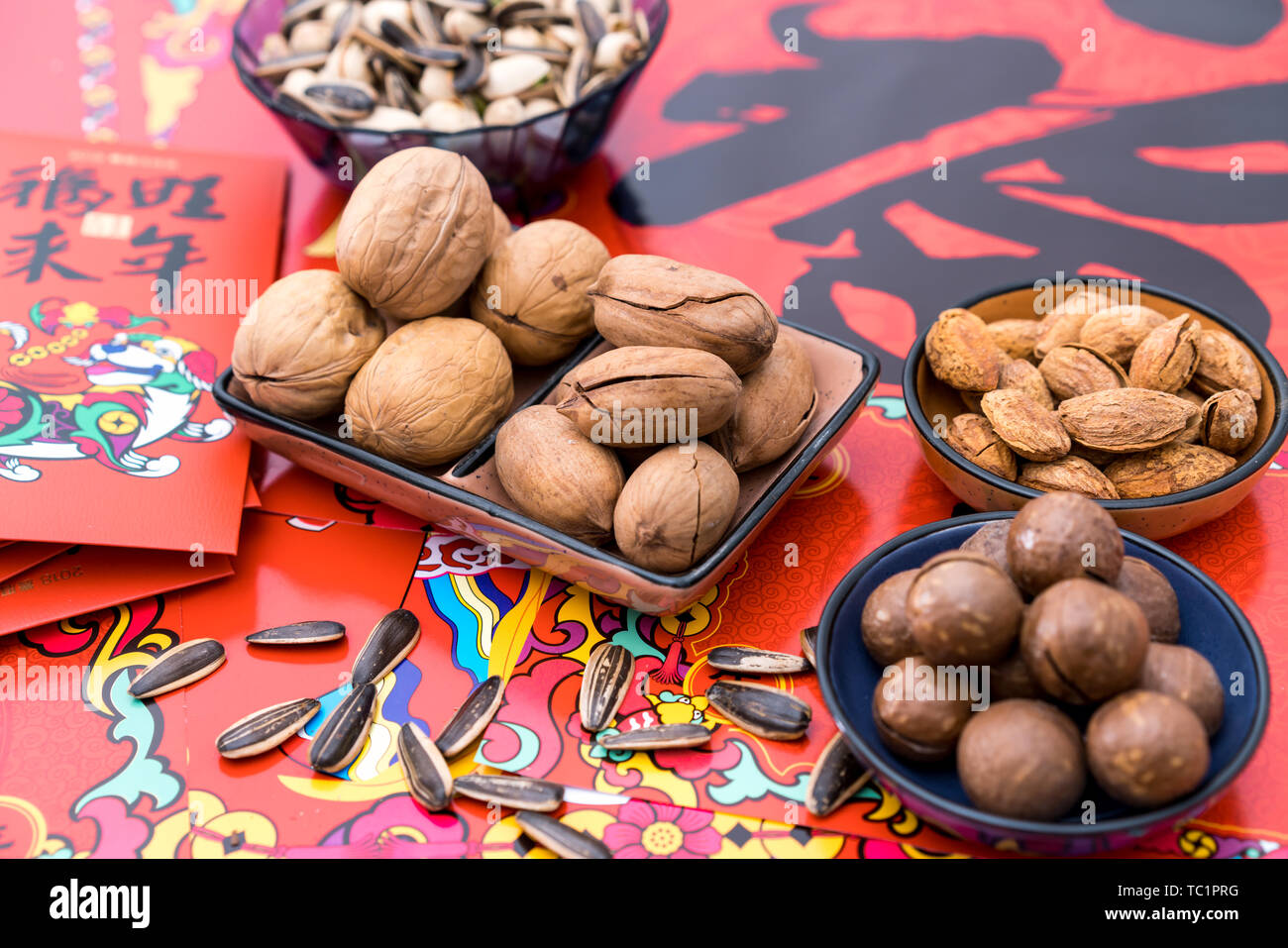 Nuts against the background of Spring Festival red couplets Stock Photo ...