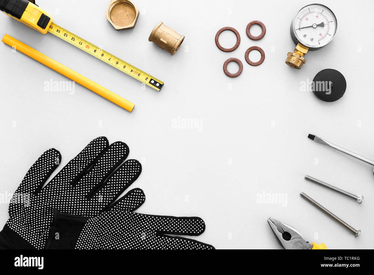 Frame made of plumber tools on white background Stock Photo - Alamy
