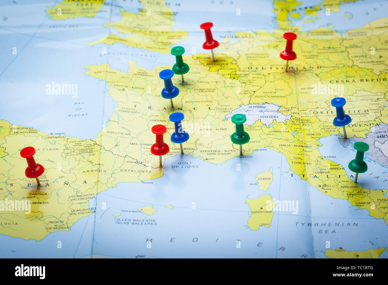 Travel destination points on a map indicated with colorful thumbtacks ...