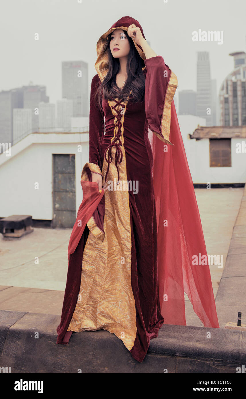 The beautiful mage in red Stock Photo - Alamy