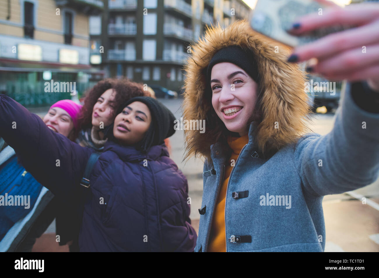 group of young multiracial women taking selfie with smartphone outdoor – friendship, vacation ...