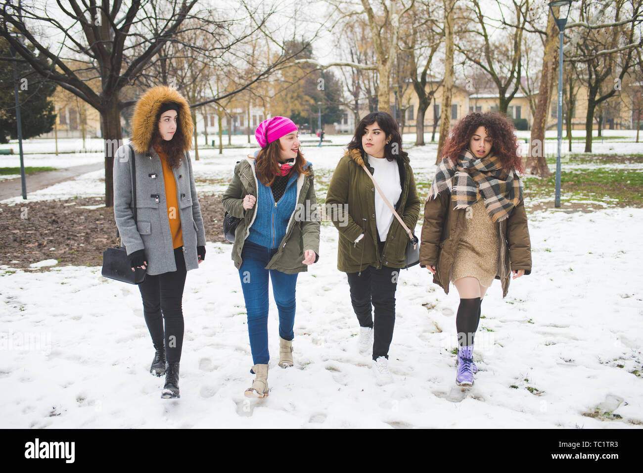 group of young women walking outdoor in winter day – relationship ...