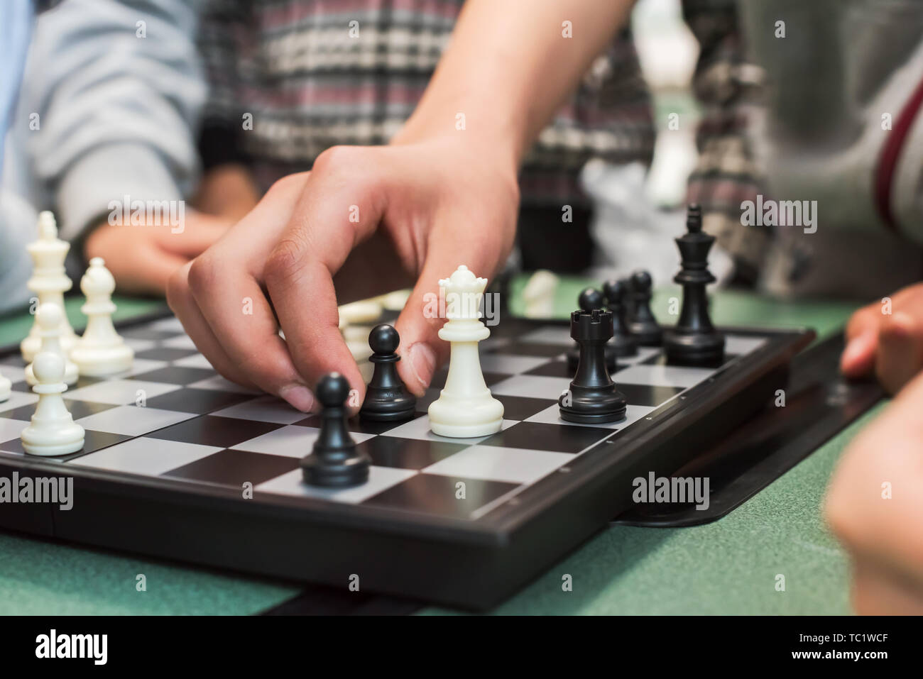 A student who plays chess Stock Photo - Alamy