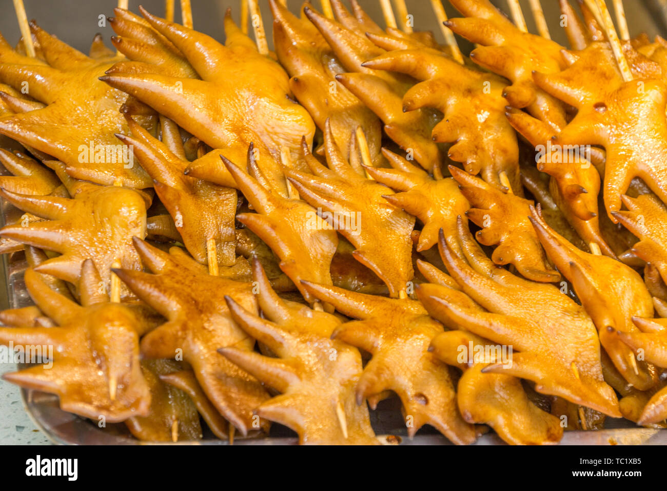 Close-up of chicken crown string of snacks in Chengdu, Sichuan, China ...