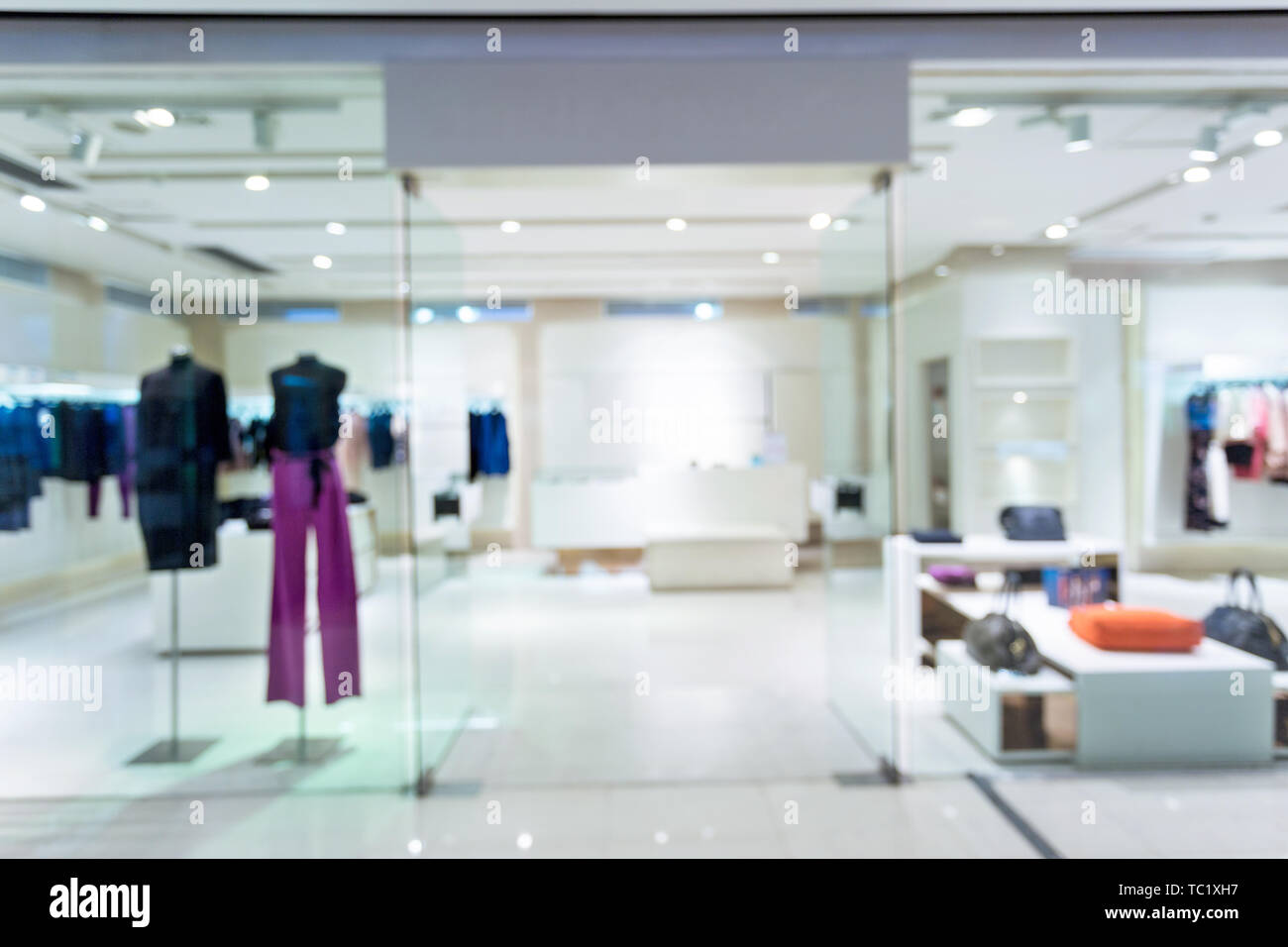 Boutique display window with mannequins in fashionable dresses Stock ...