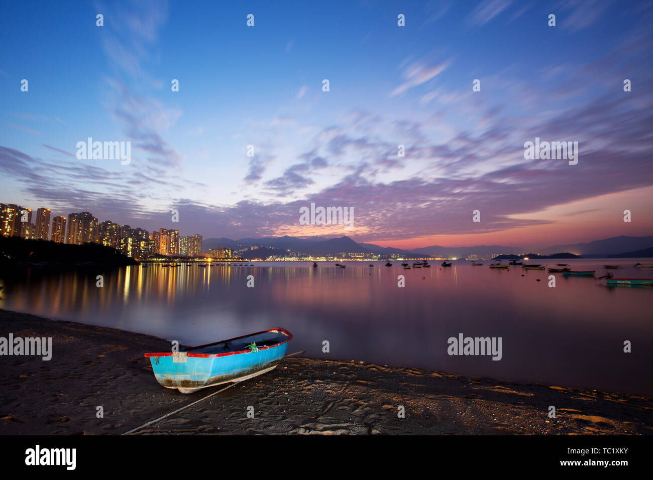 Boat with sunset Stock Photo - Alamy