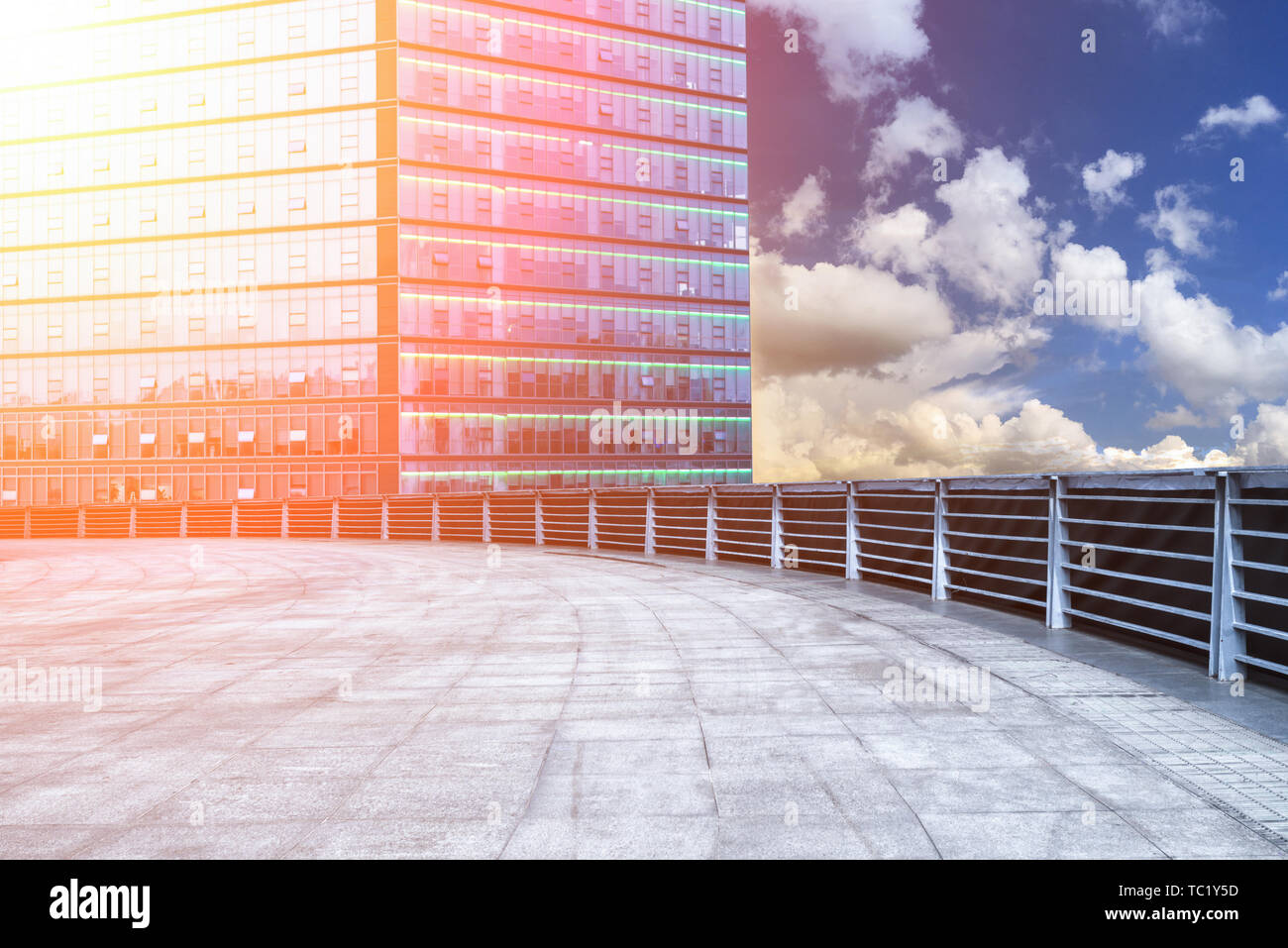 Towering urban architecture with curved viewing platform Stock Photo ...