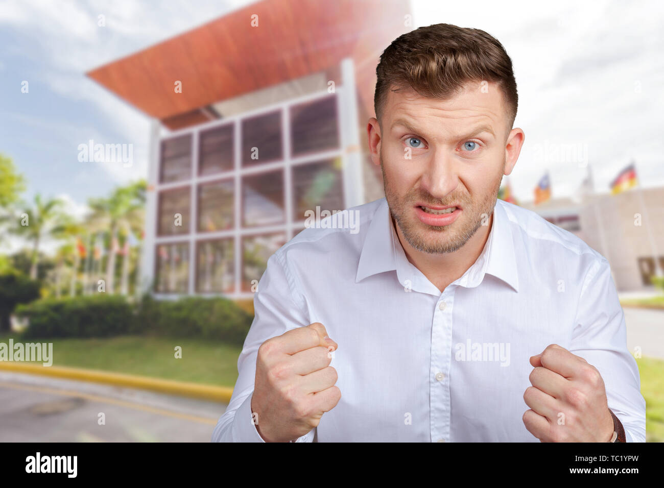 Portrait Of Angry Young Man Stock Photo - Alamy