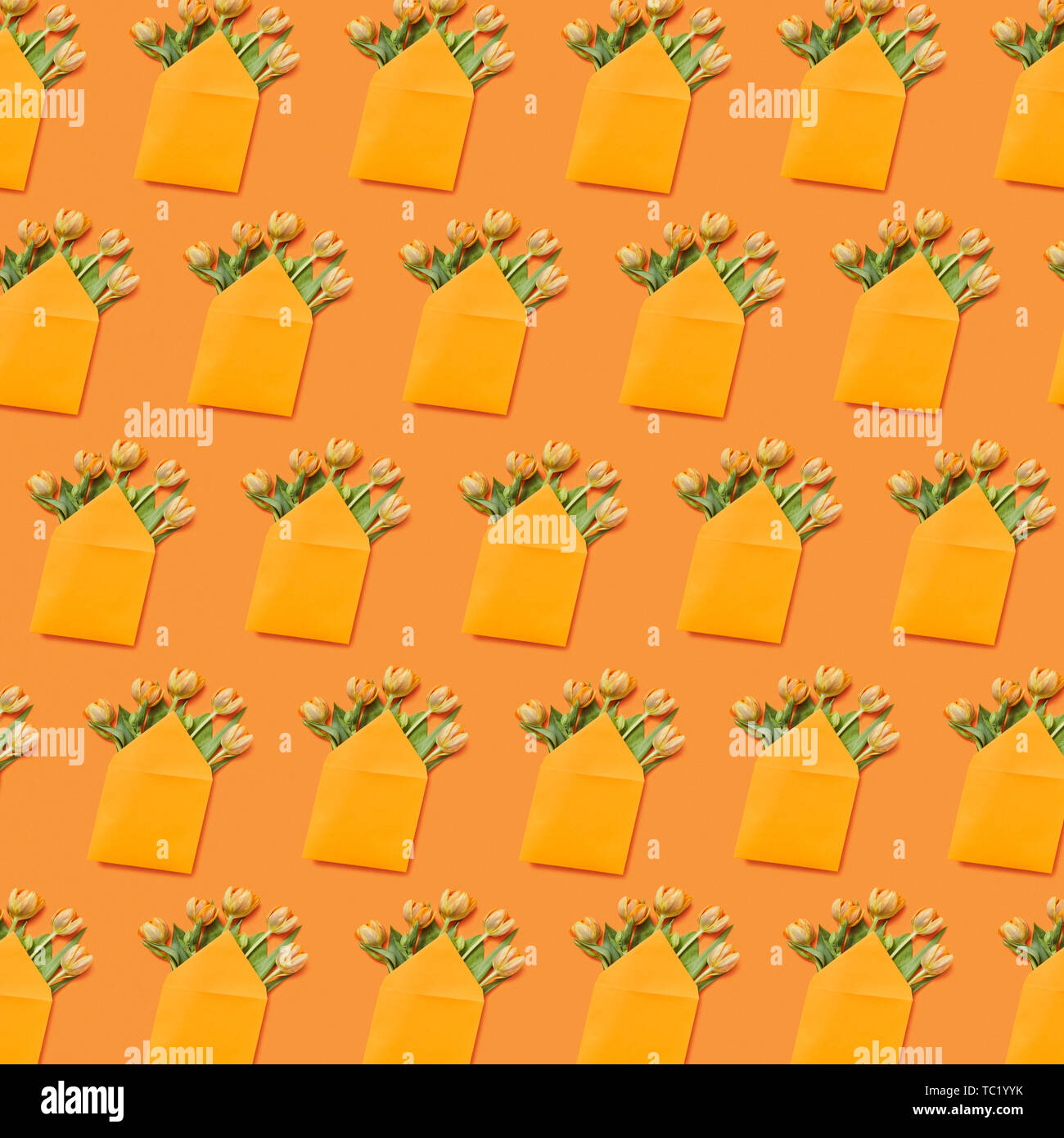 Congratulations background with tulips bouquets in envelopes at yellow ...
