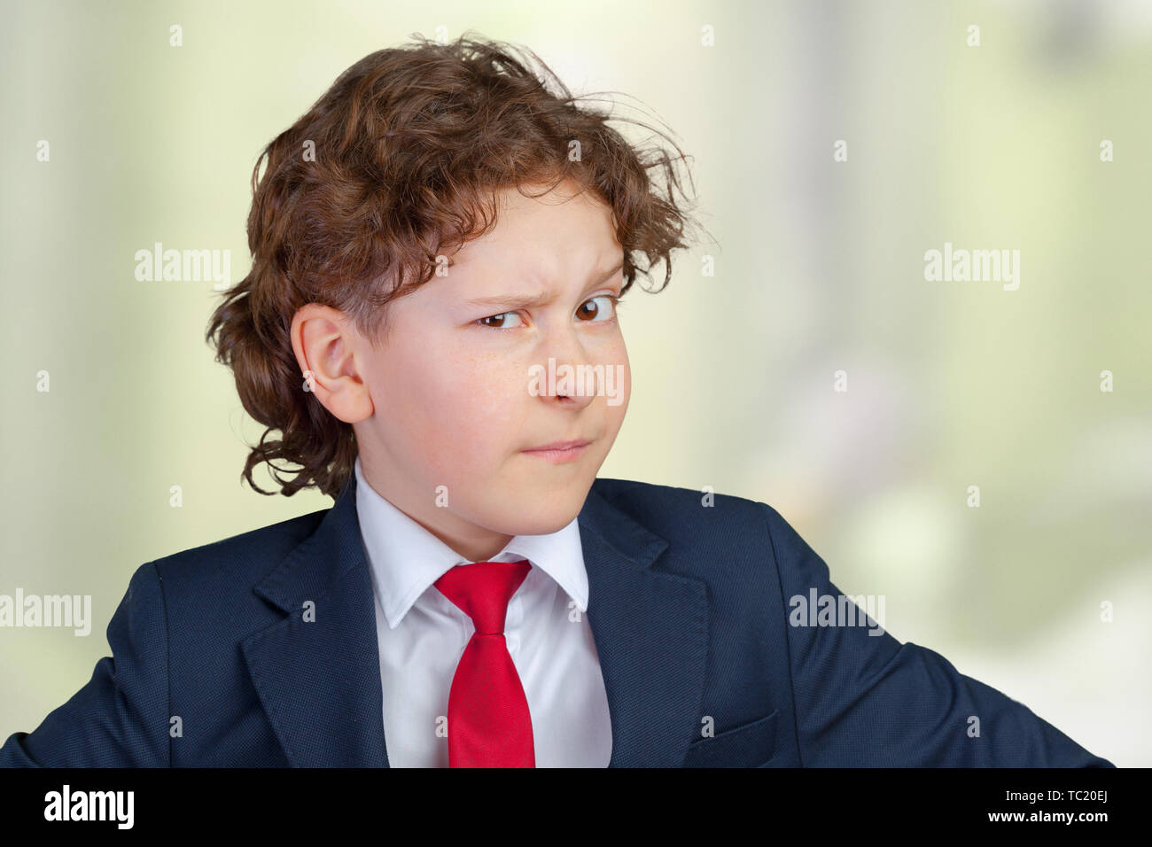 Closeup up portrait of s suspicious, cautious child boy Stock Photo - Alamy