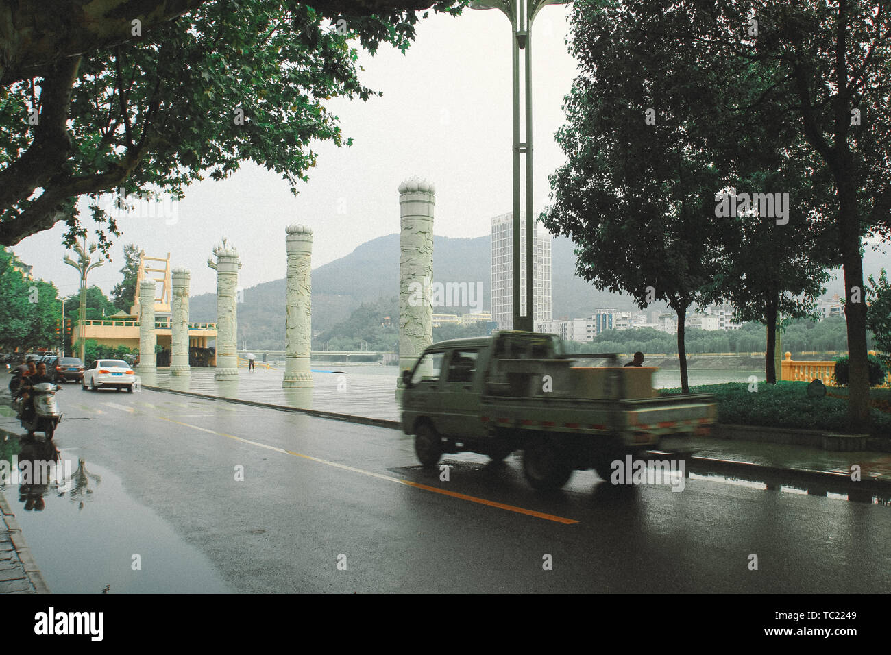 A car flying down the road Stock Photo - Alamy