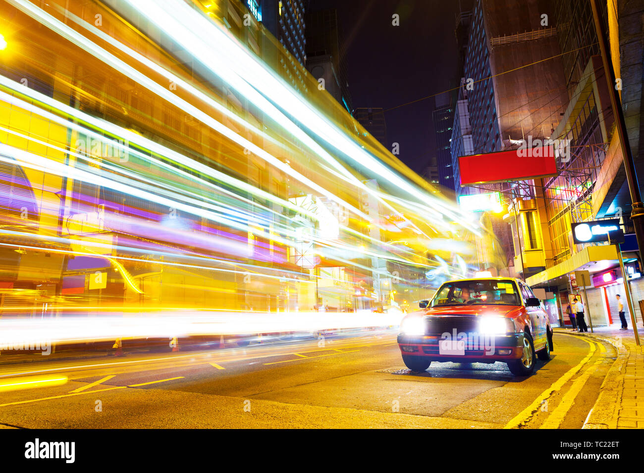 traffic light trails in modern city at night Stock Photo - Alamy