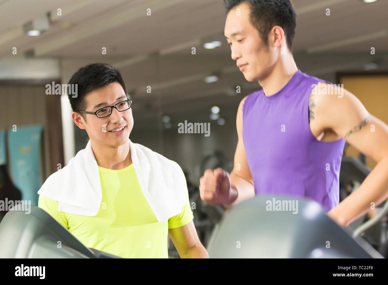 young asian men working out in modern gym Stock Photo - Alamy