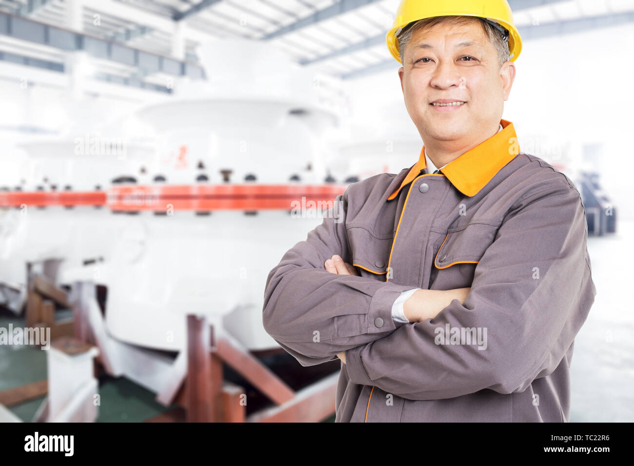 old asian man engineer in modern factory Stock Photo - Alamy