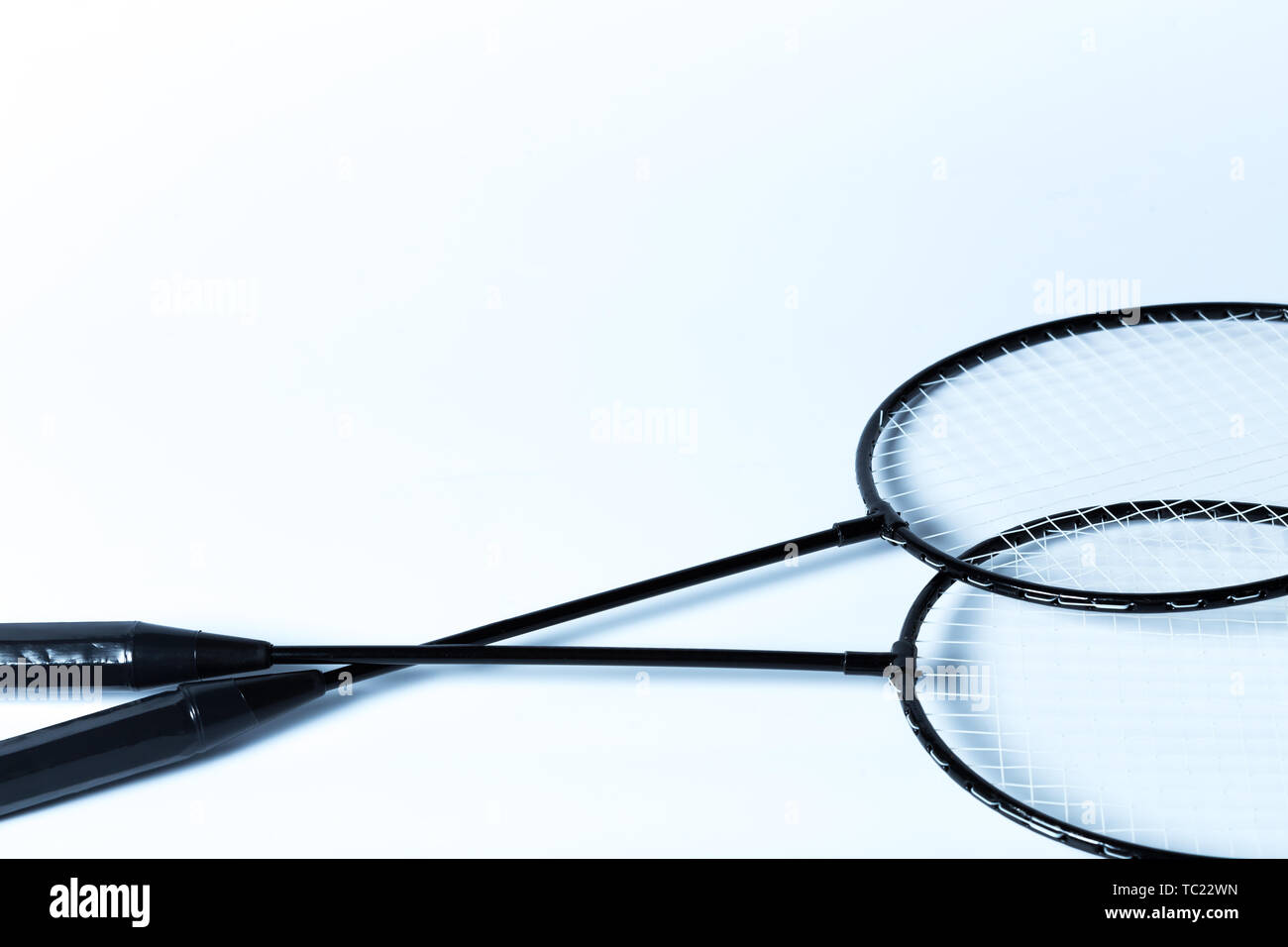 Badminton rackets on white Stock Photo - Alamy