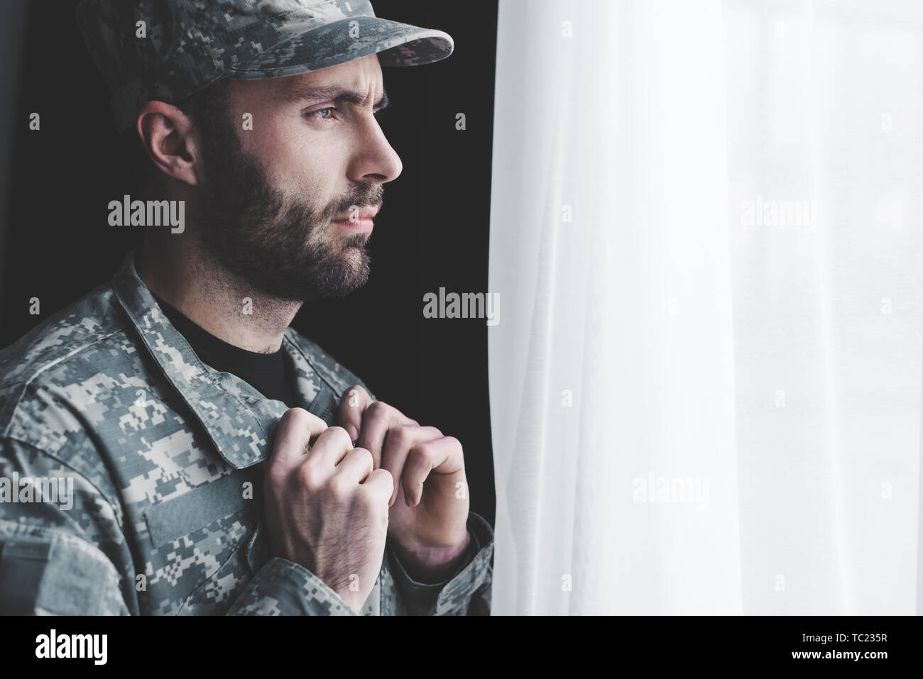 Bearded man in army cap hi-res stock photography and images - Alamy