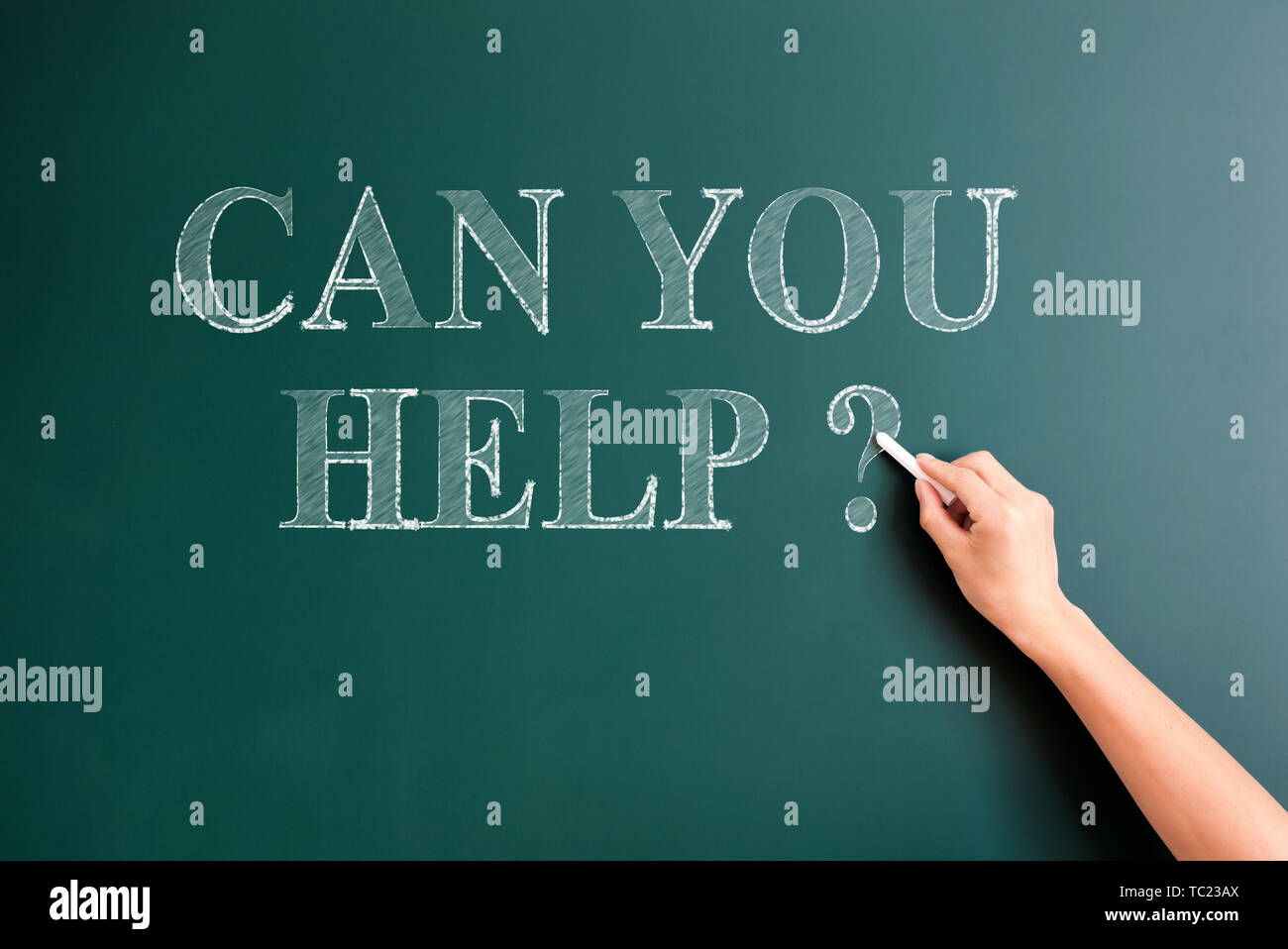 writing can you help on blackboard Stock Photo - Alamy