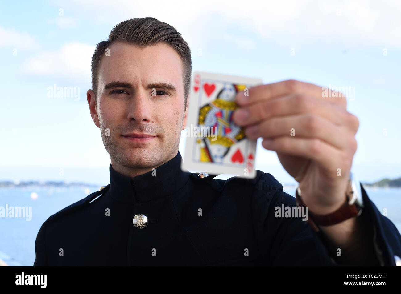 Holds a playing card on the mv bouddica in poole hi-res stock ...