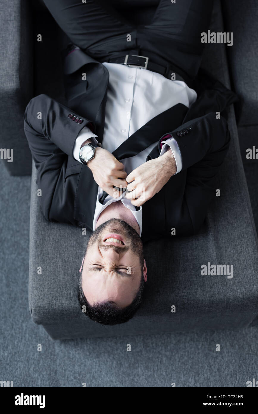 Untying tie hi-res stock photography and images - Alamy