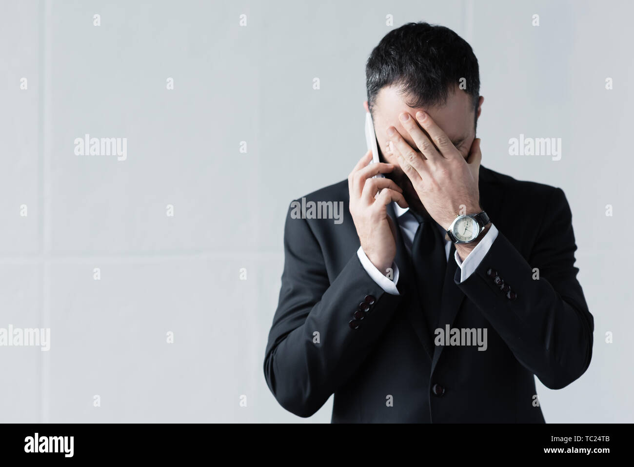 Formal suit and disappointed hi-res stock photography and images - Alamy