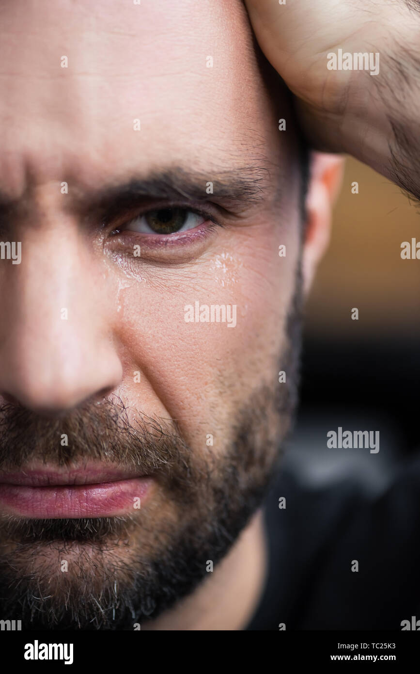 Man looking at camera crying hi-res stock photography and images - Alamy