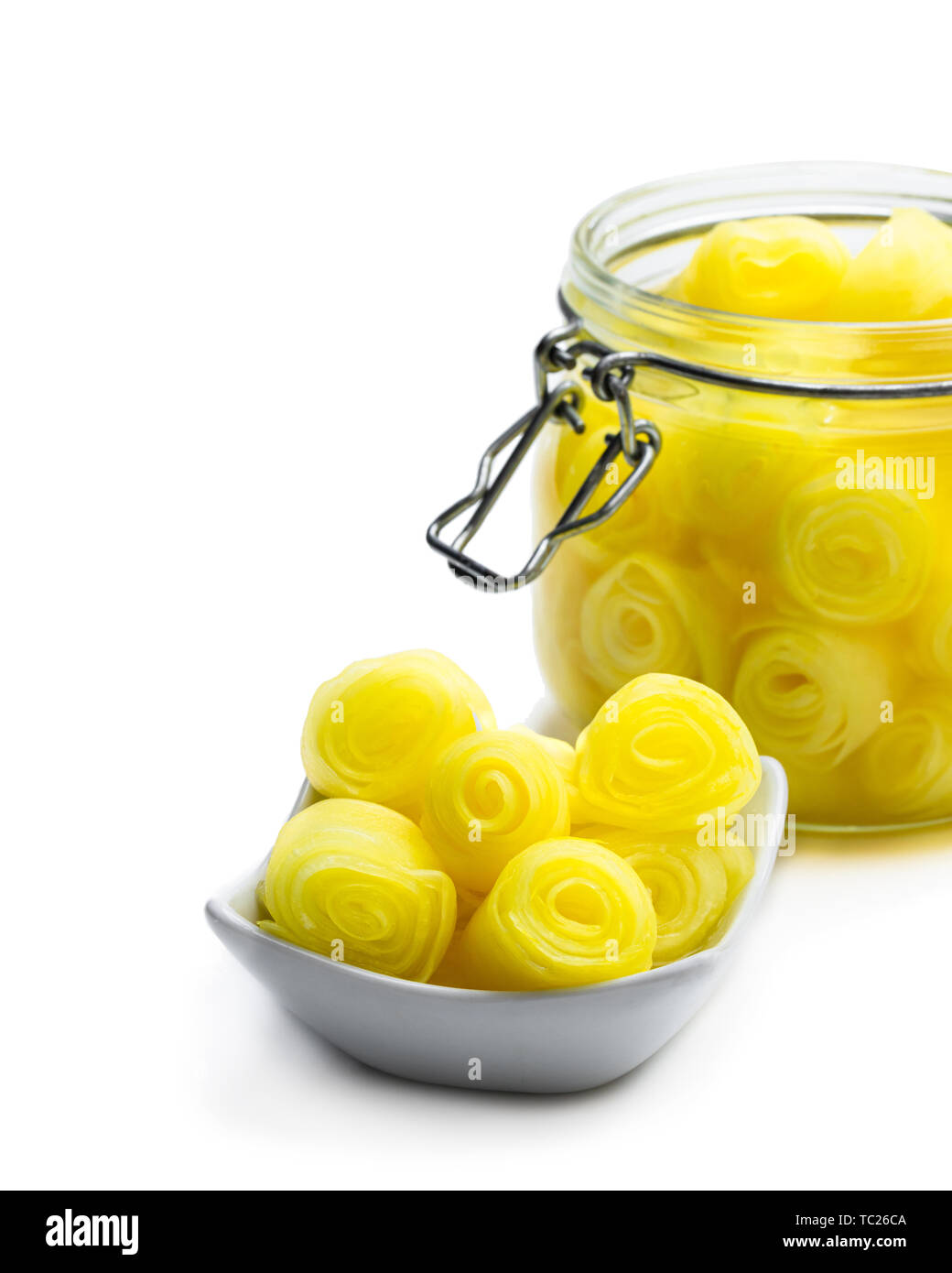 Marinated daikon isolated on white Stock Photo - Alamy