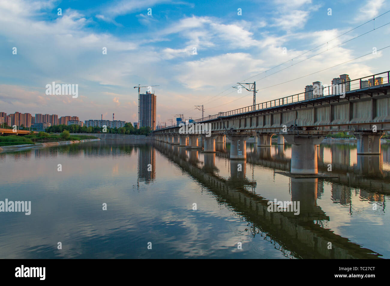 City View / cross-river bridge reflection Stock Photo - Alamy