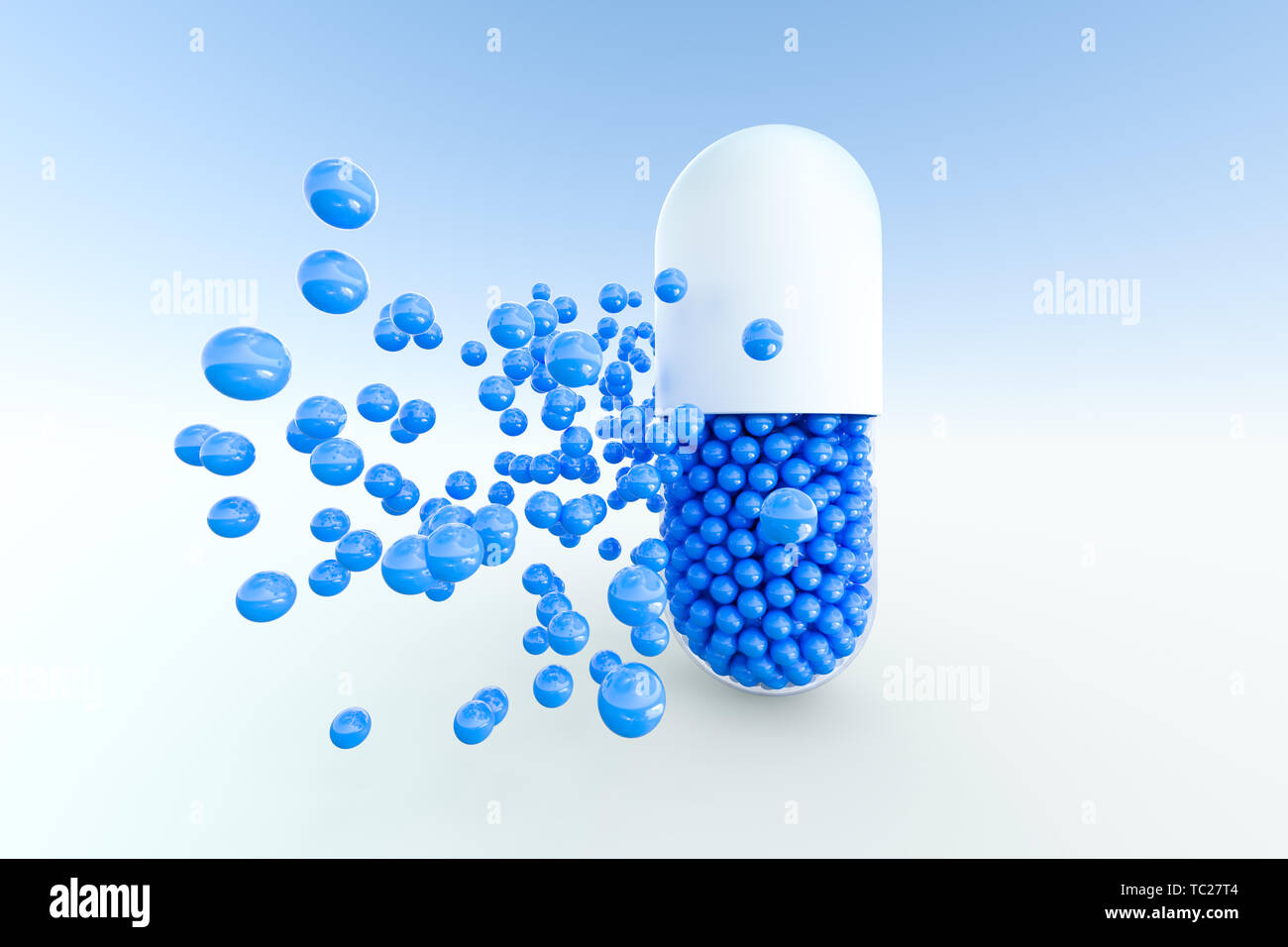 Blue granular capsule, 3-D rendering Stock Photo - Alamy