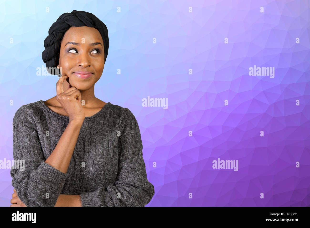 Young African American woman thinking Stock Photo - Alamy