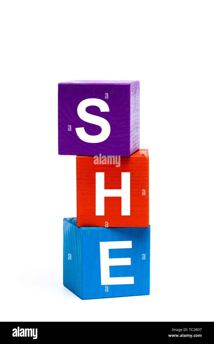 wooden toy cubes with letters. She Stock Photo - Alamy
