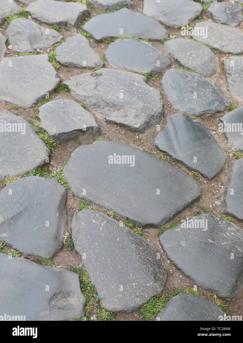 stones of a antique roman road in Rome Stock Photo - Alamy