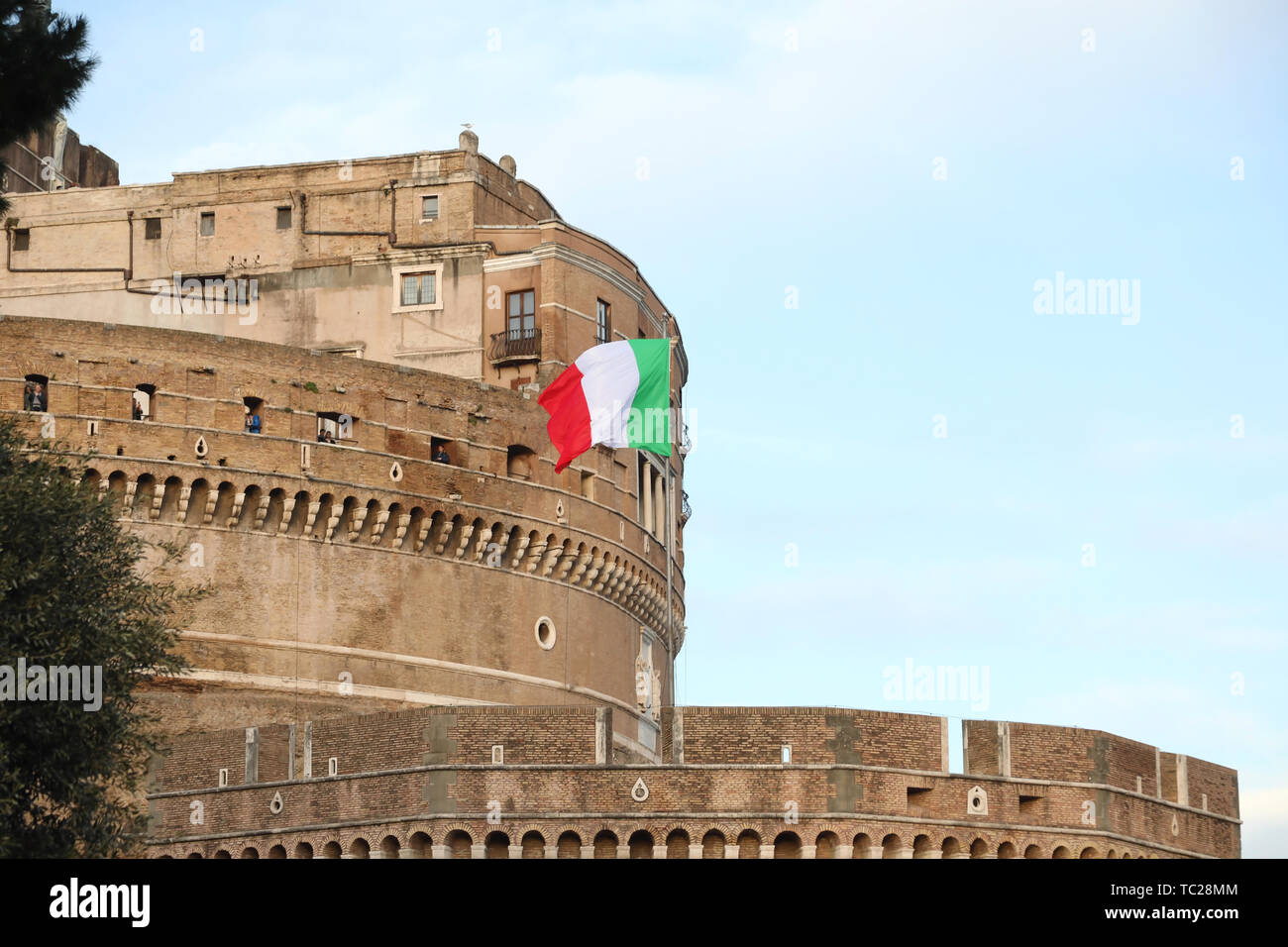Italian tricolor flag waving above Castel Sant'Angelo in Rome Stock ...