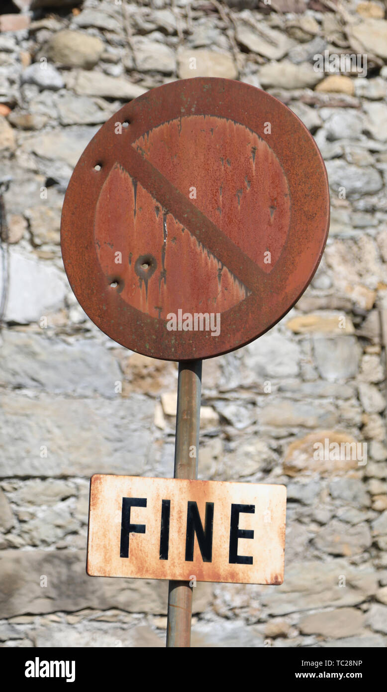 Italian road sign no parking with the word FINE which means END in the ...