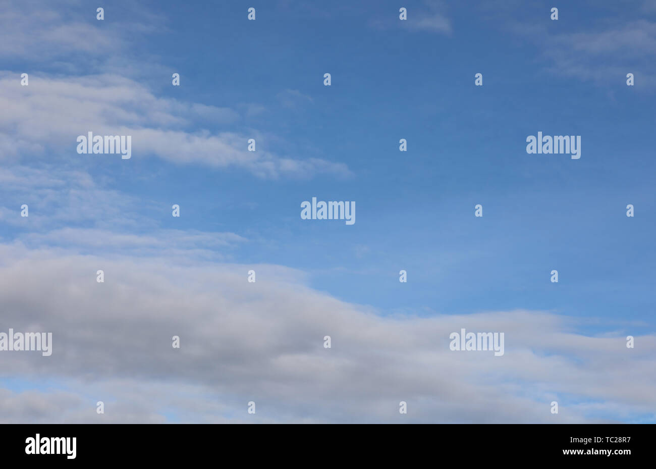 horizontal blue sky with white clouds ideal as nature backdrop Stock Photo - Alamy