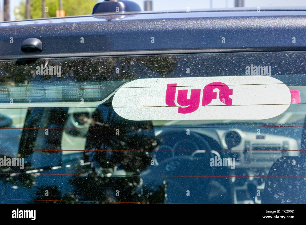 May 30, 2019 Milpitas / CA / USA - Lyft sticker on the rear window of a ...