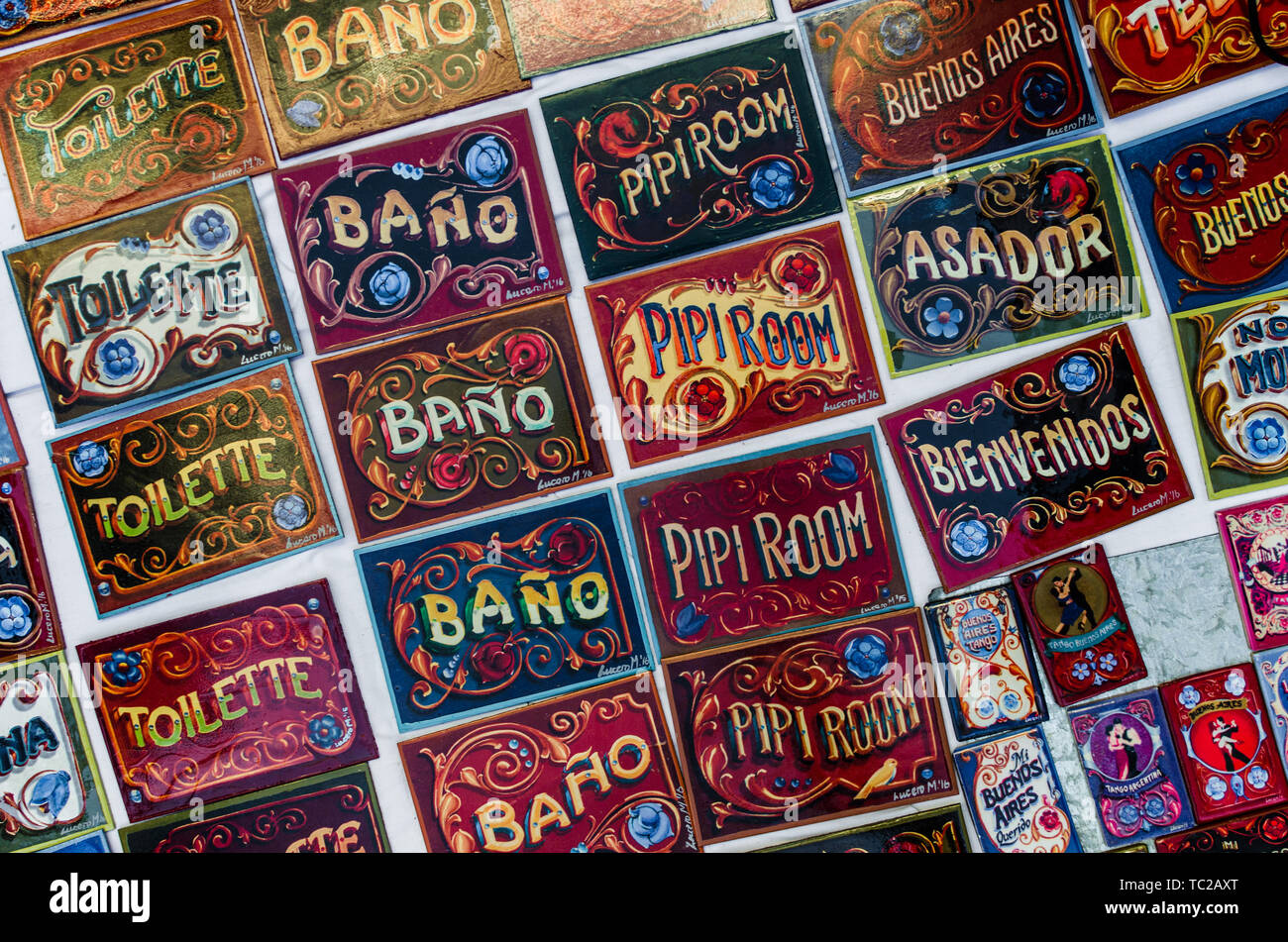 Colored door signs, made in traditional style of painting fileteado ...